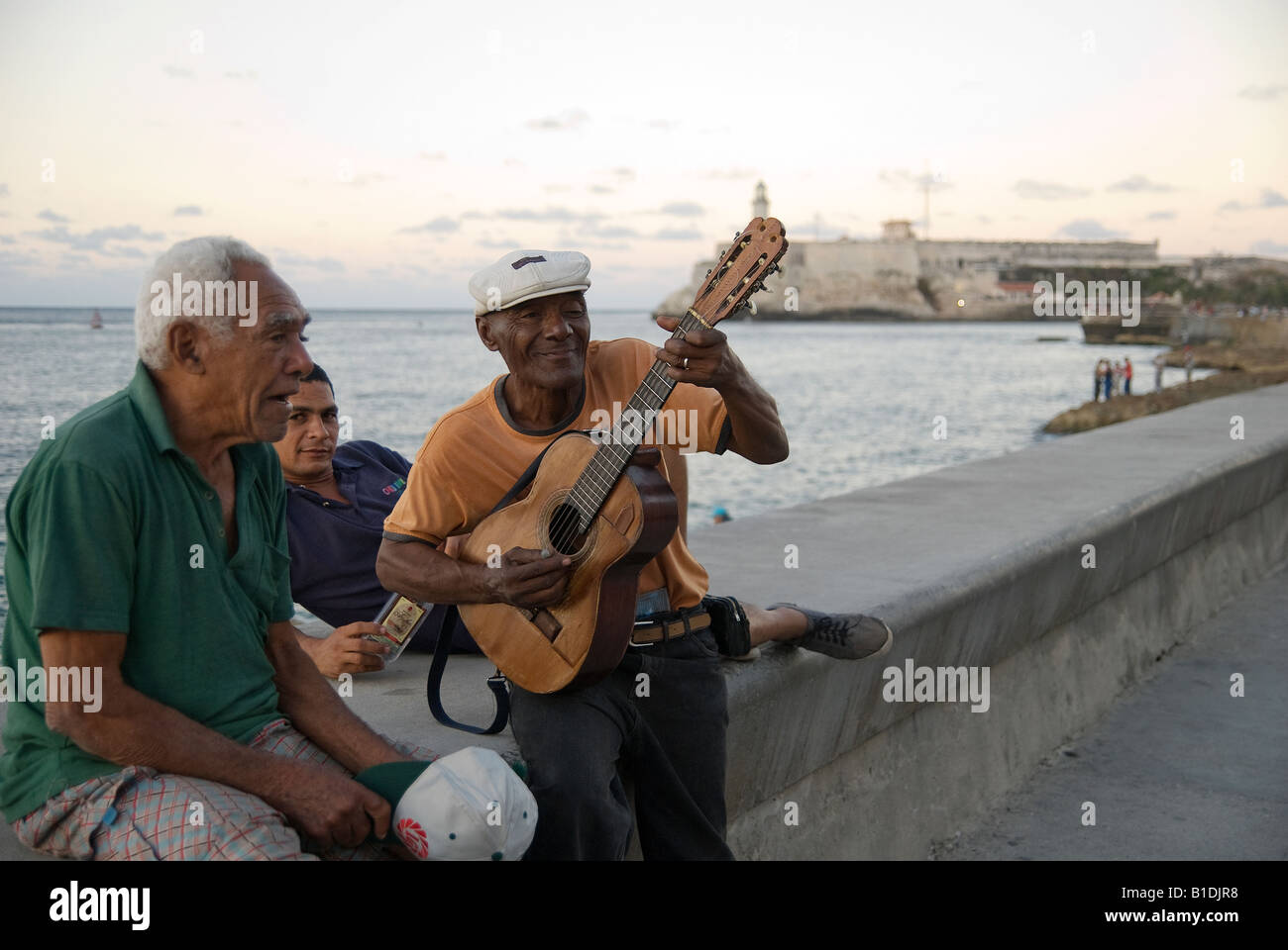 Cuban musician on the Malecón, Havana Stock Photo - Alamy