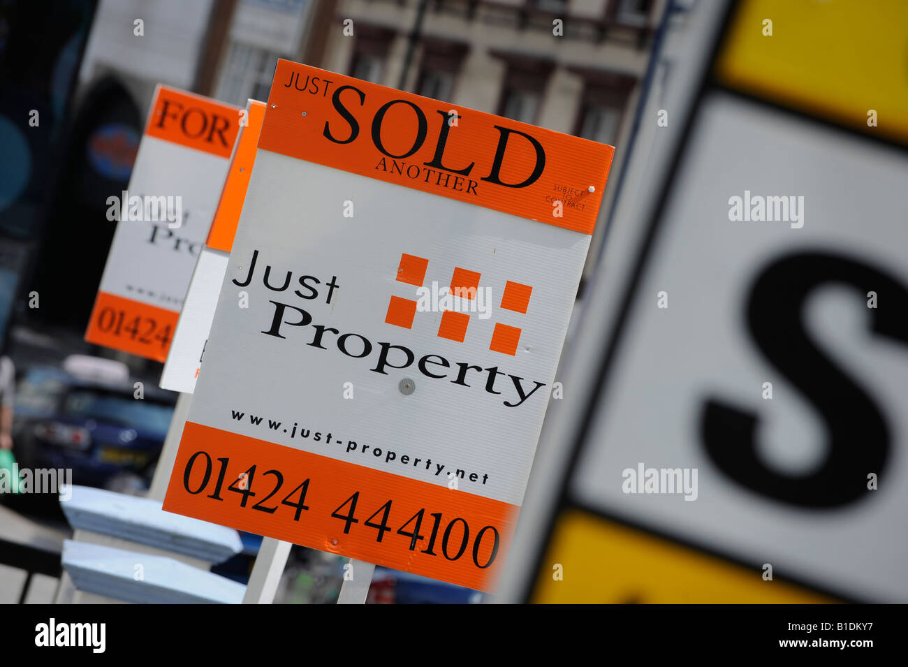 Hastings estate agent for sale boards jostle for the best position on a ...