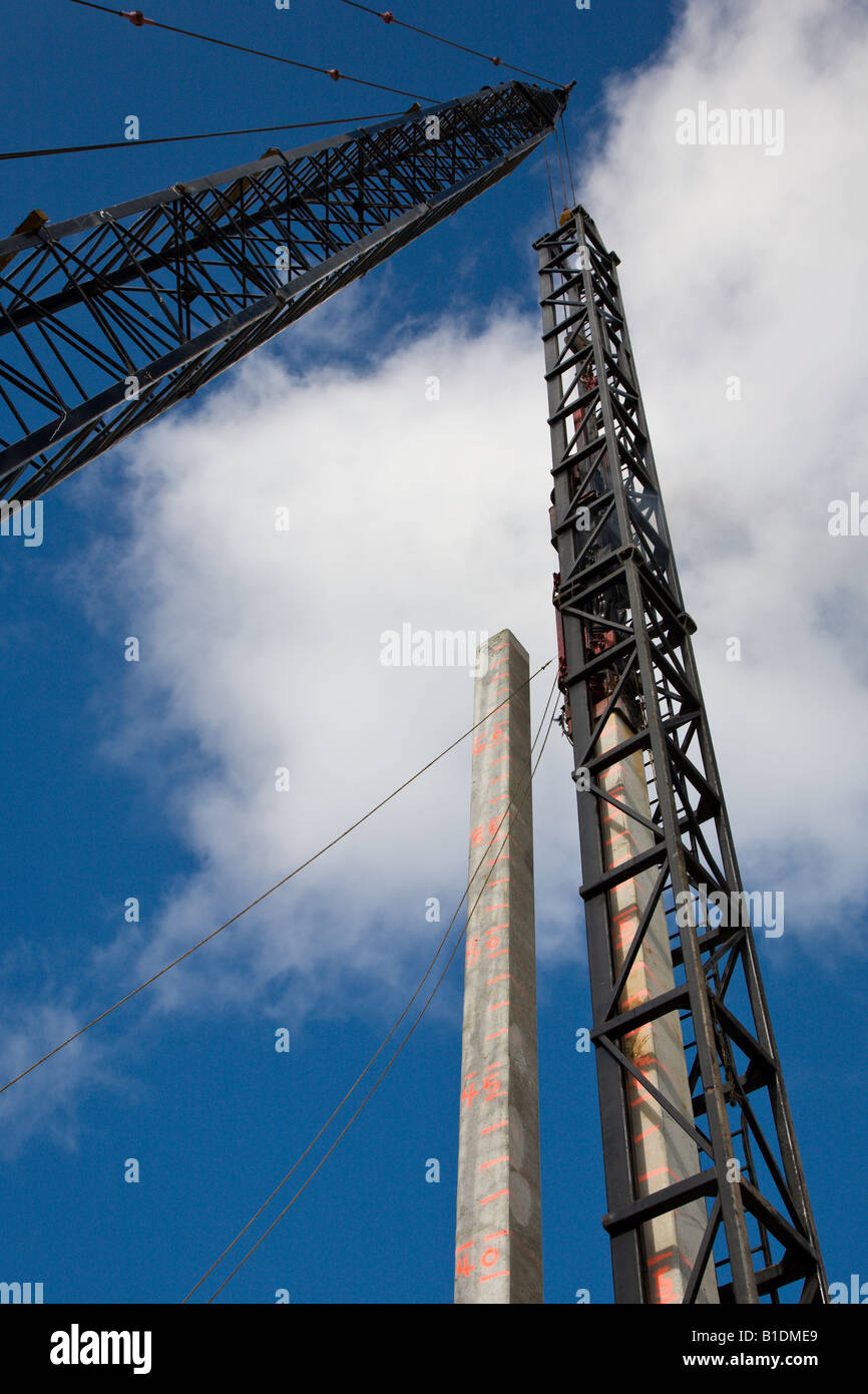 Pile driving equipment installing concrete piling Stock Photo - Alamy