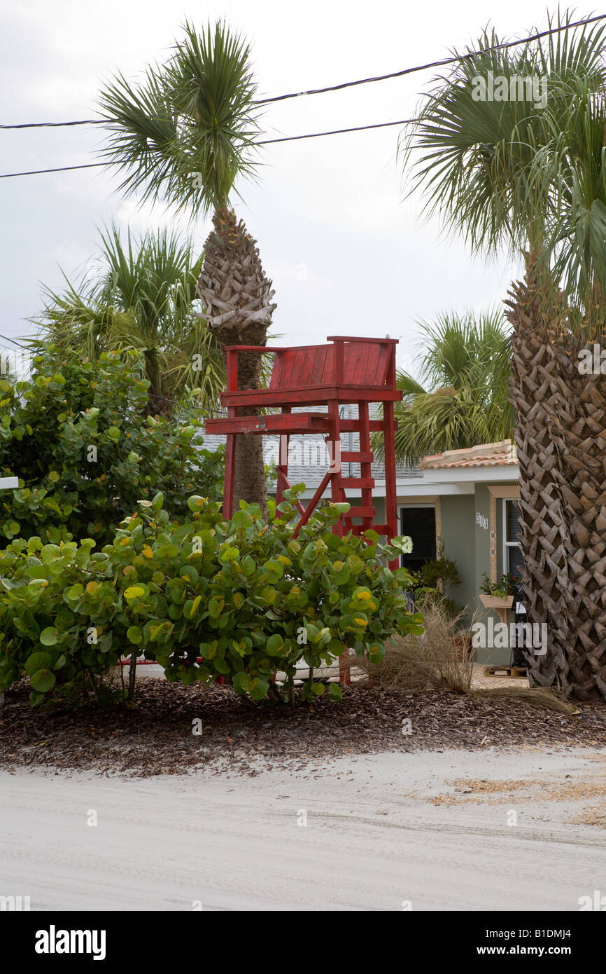 Wooden lifeguard stand in front of home in residential beach community ...