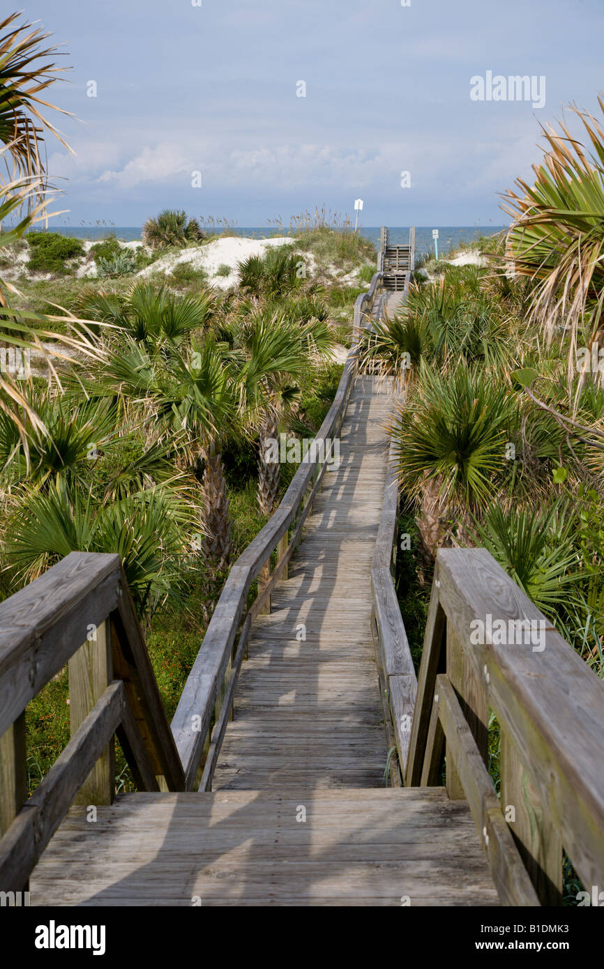 Wooden deck walkway provides Atlantic Ocean beach access over sand ...
