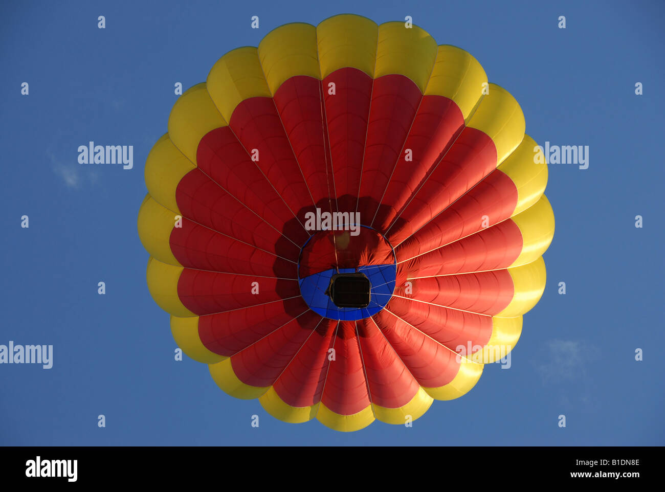 one hot air balloon in blue sky Stock Photo - Alamy