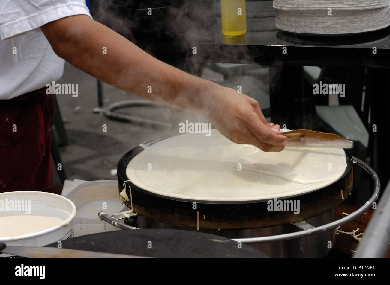 Man making crepes hi-res stock photography and images - Alamy