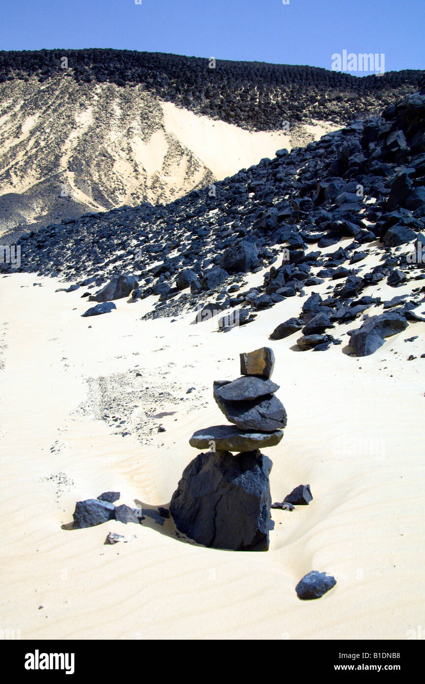 A mountain of volcanic origin in the Black Desert of western Egypt ...
