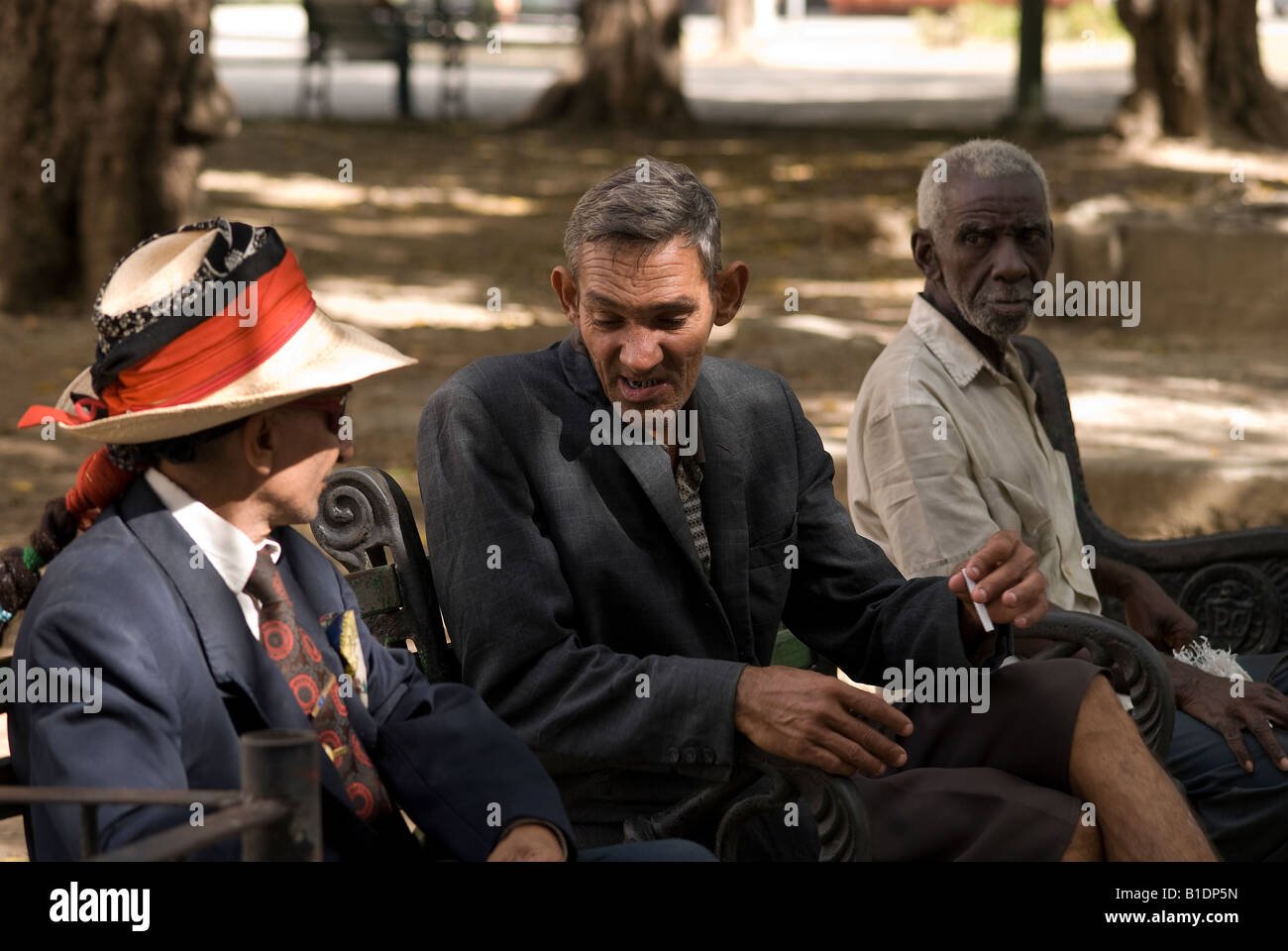 Old cuban men takes a rest in a park of La Habana Vieja Stock Photo - Alamy