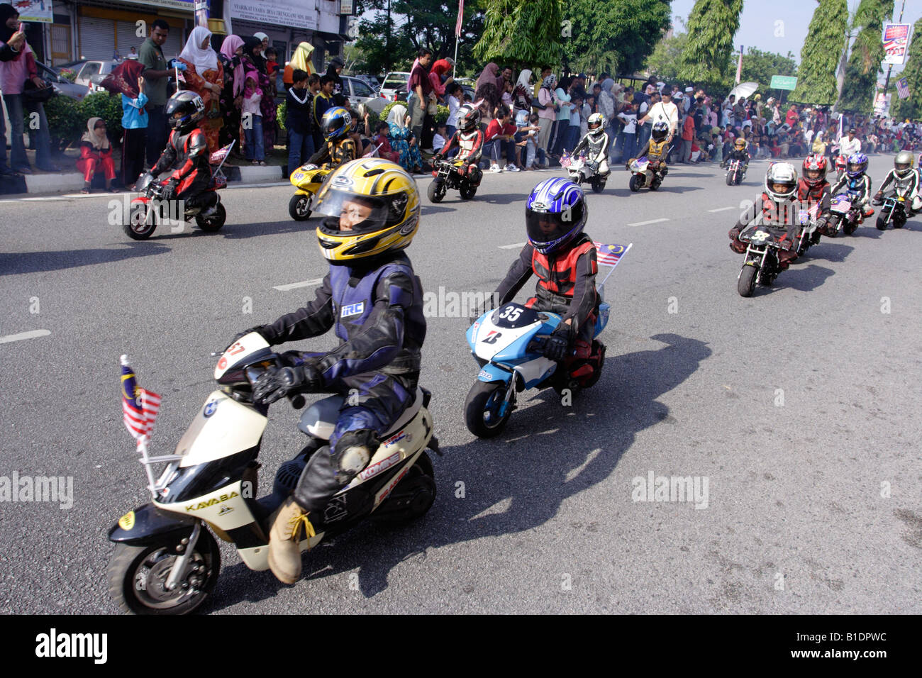 Pocket racing bike in a parade celebrating Malaysia's 50th Independence ...