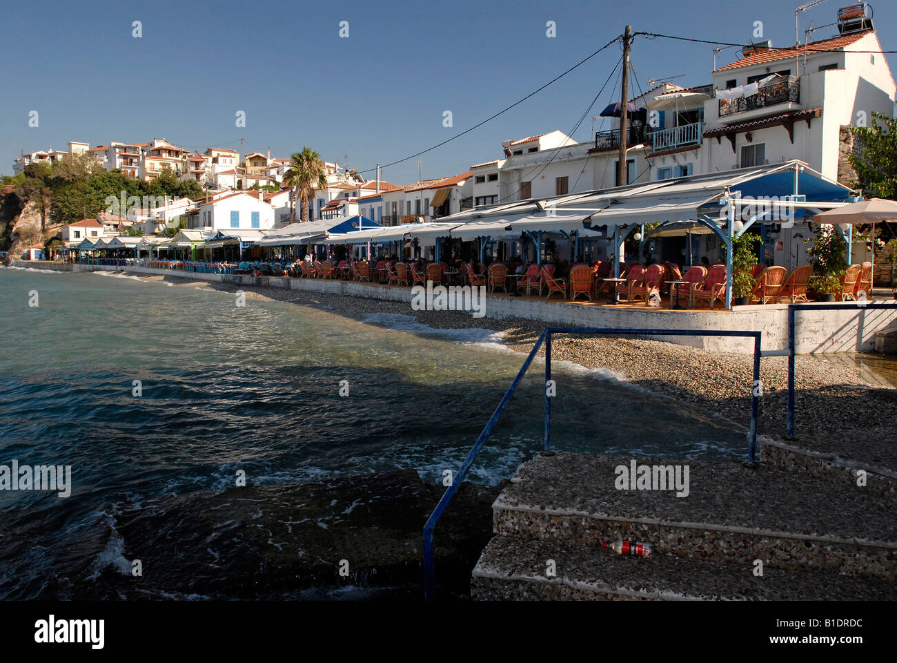 Bar-Cafes and Tavernas along the seafront in Kokkari on the island of ...