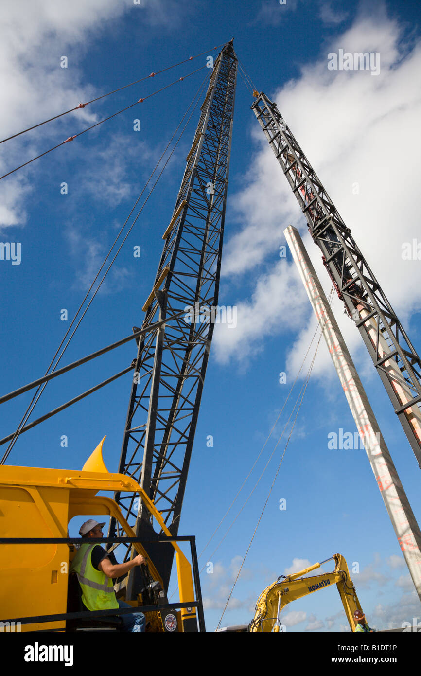 Pile driving equipment installing concrete piling Stock Photo - Alamy