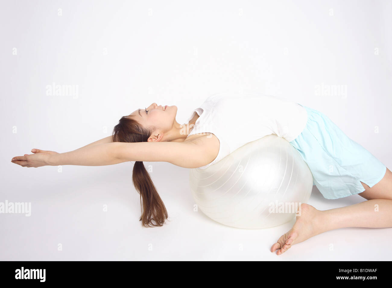 Japanese woman doing exercise Stock Photo - Alamy