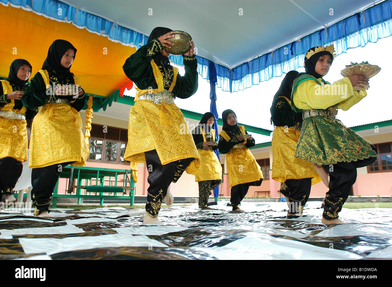 Girls perform a dance in Banda Aceh, Indonesia Stock Photo - Alamy