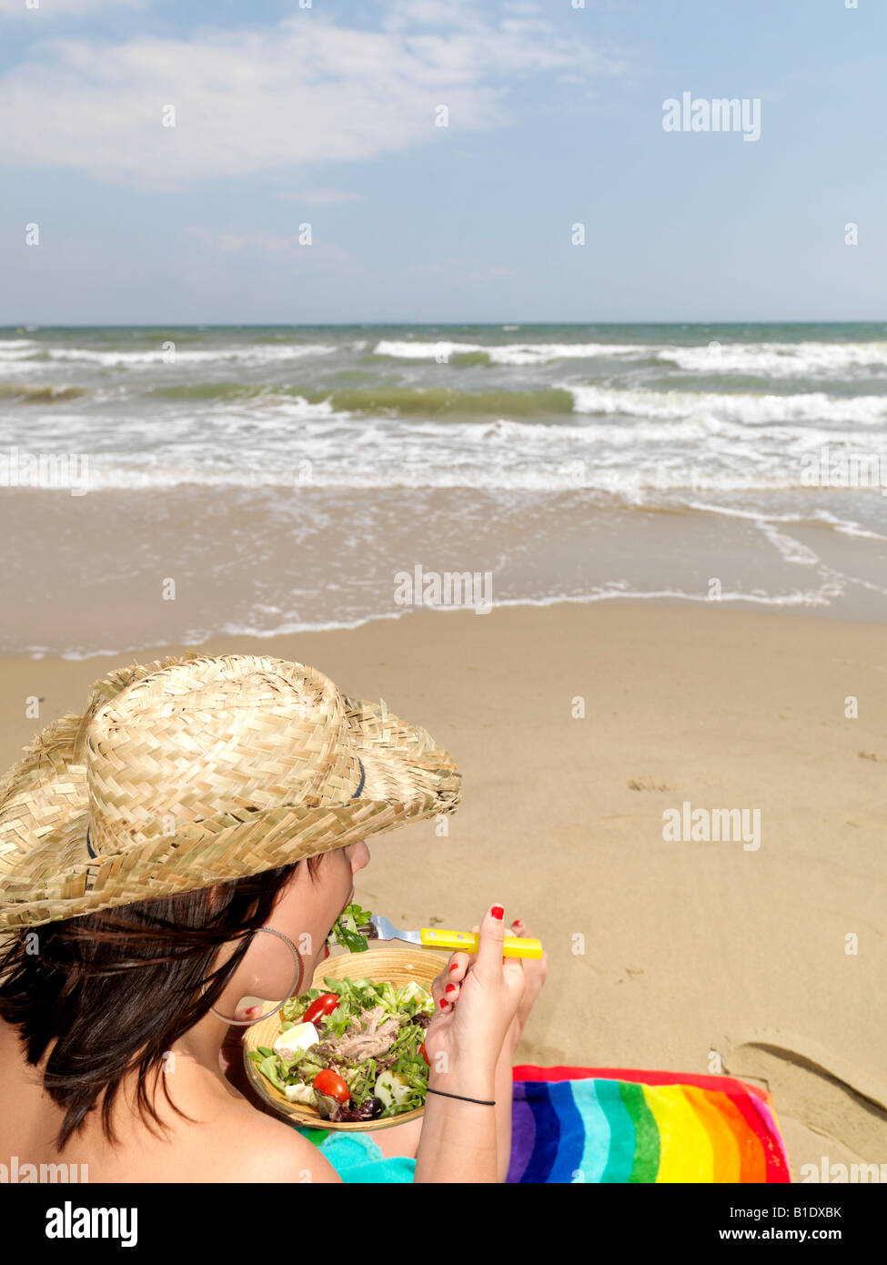 Woman eating tuna salad hi-res stock photography and images - Alamy