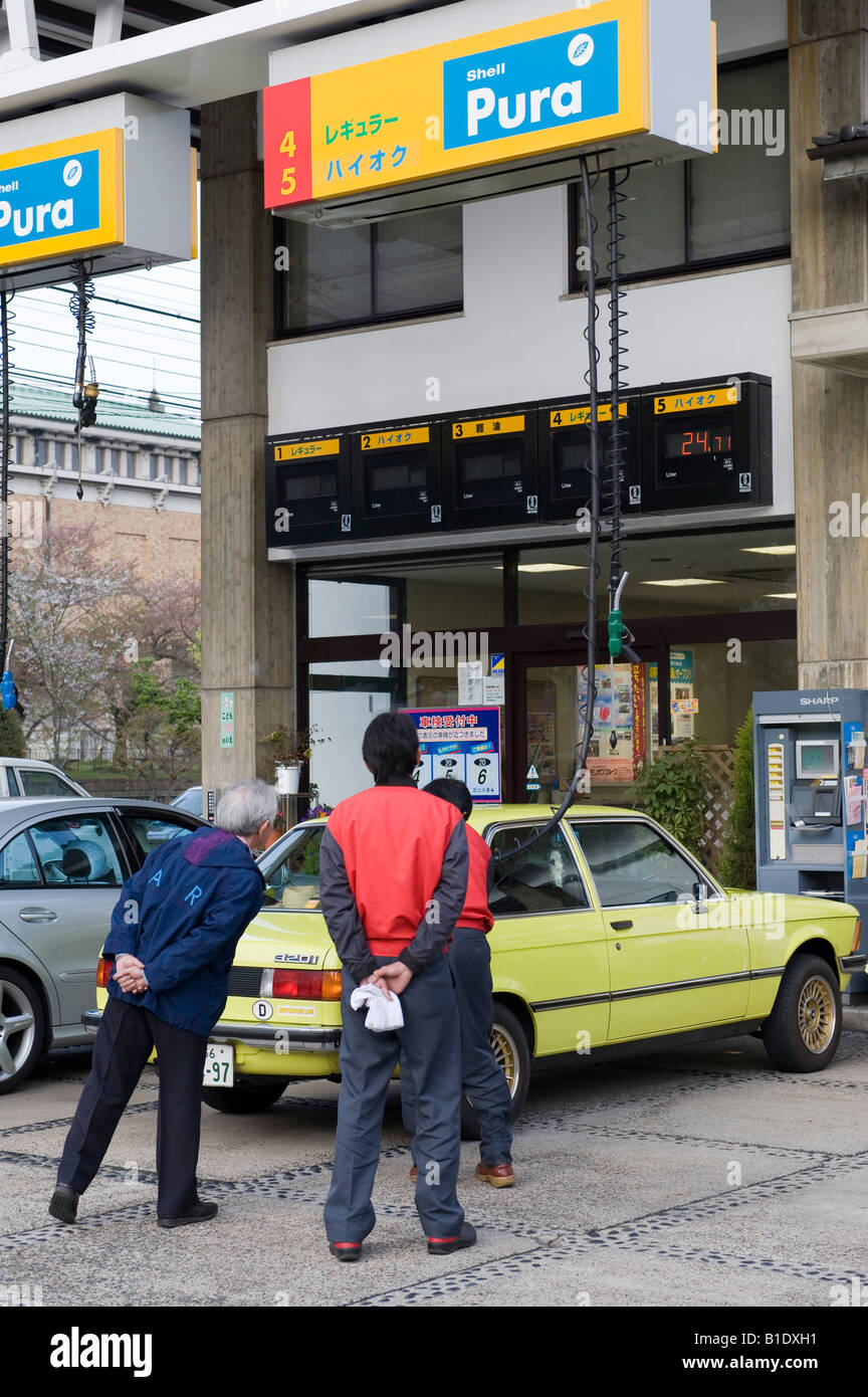 Shell petrol pumps at a shell petrol station hi-res stock photography ...