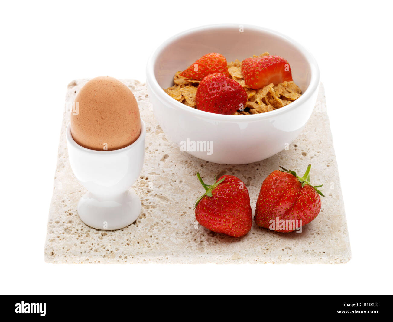 Boiled Egg with Cereal and Strawberries Stock Photo - Alamy