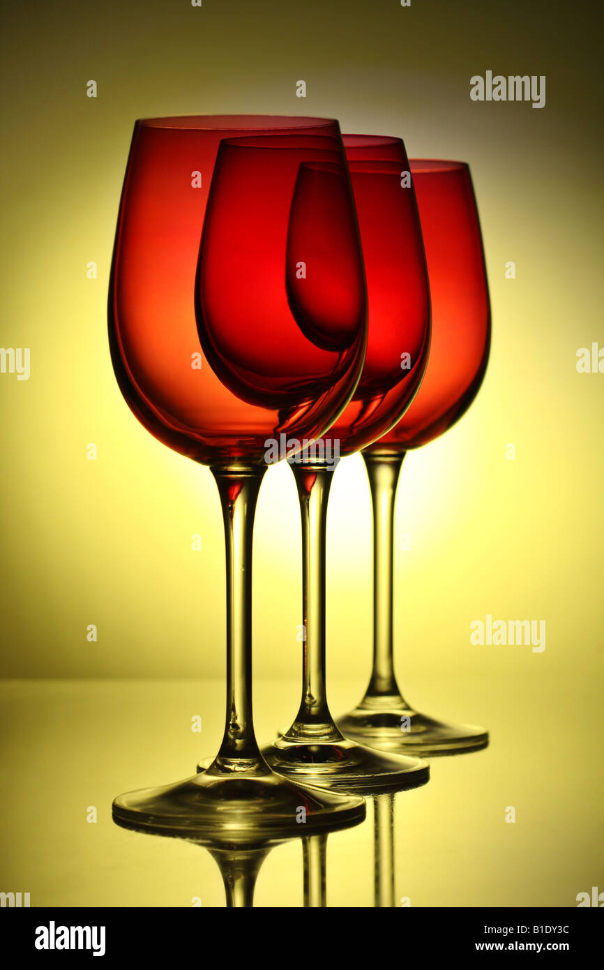 three beautiful wine glasses backlit Stock Photo - Alamy