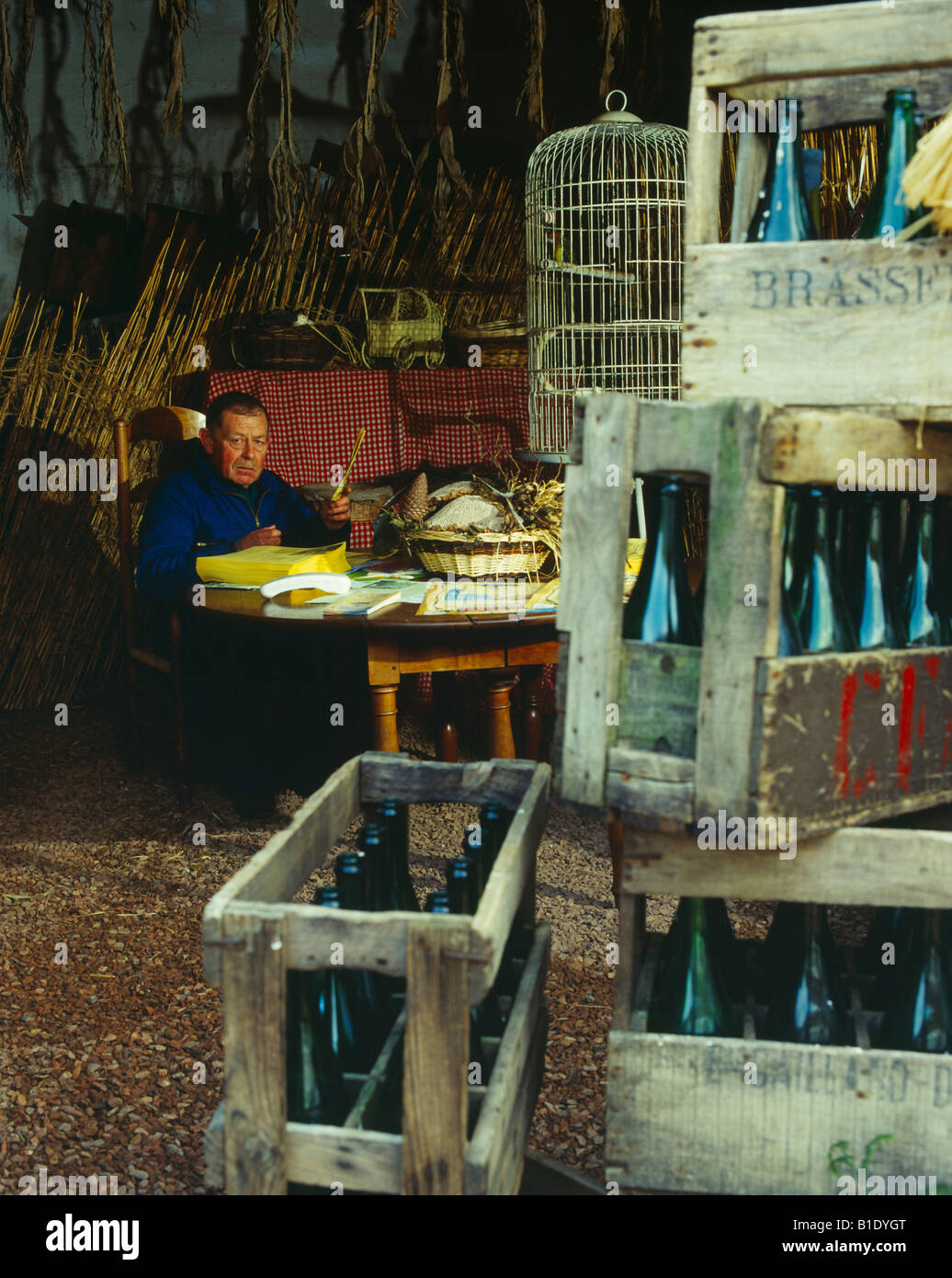 old man working in barn Stock Photo - Alamy