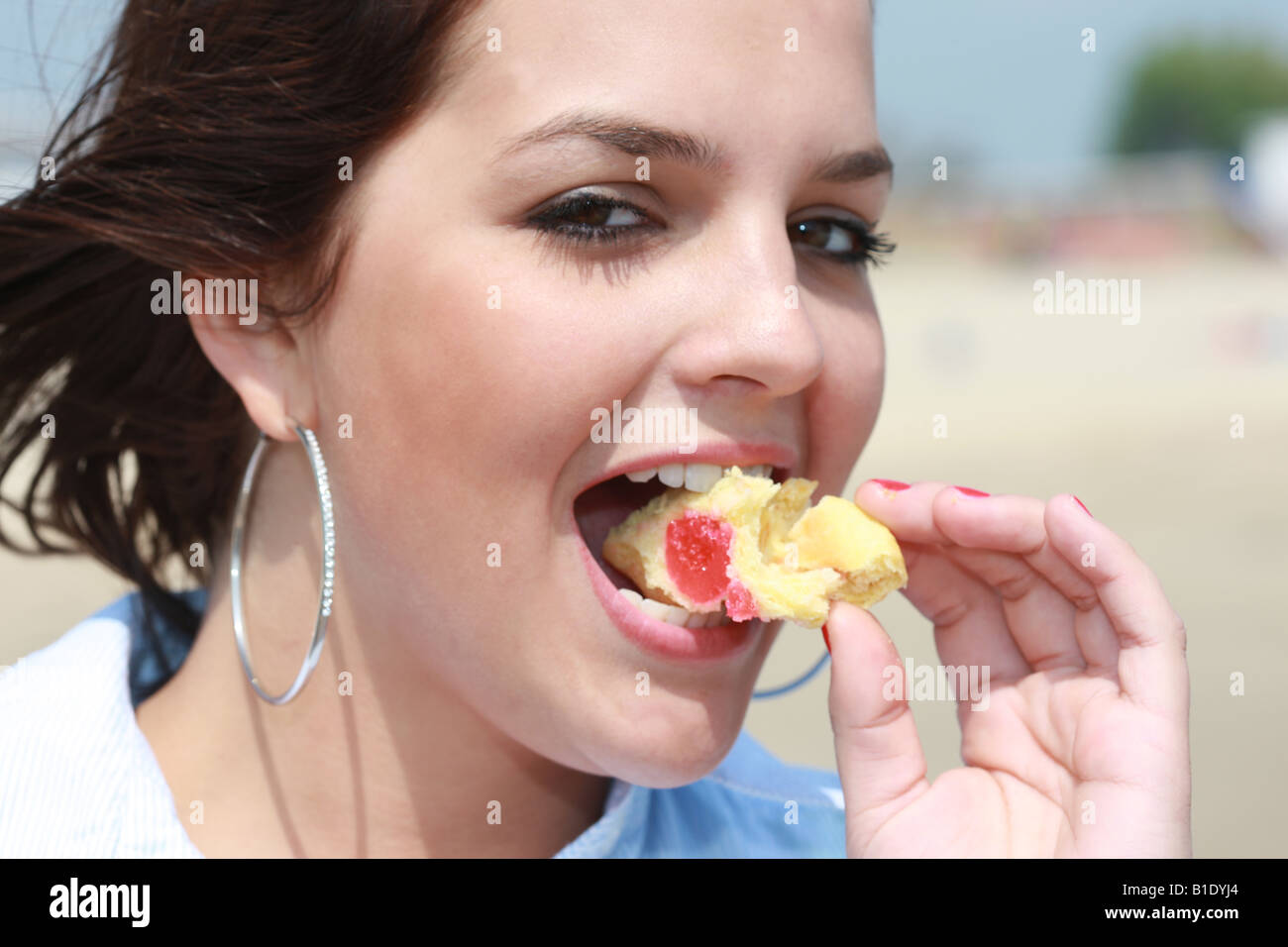 Woman eating afternoon snacks hi-res stock photography and images - Alamy