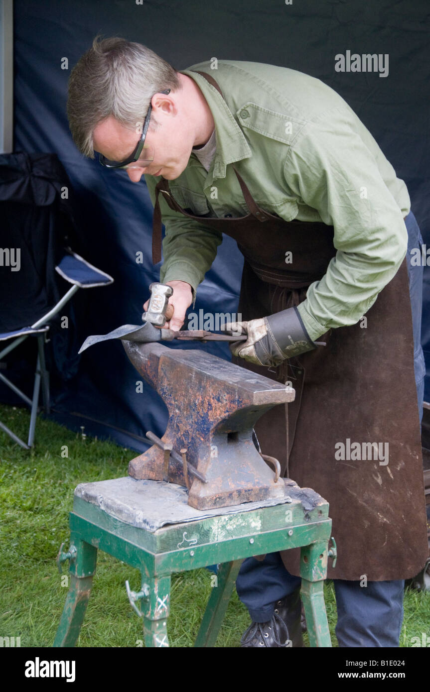 Blacksmith with forge at craft fair Derbyshire England Stock Photo - Alamy