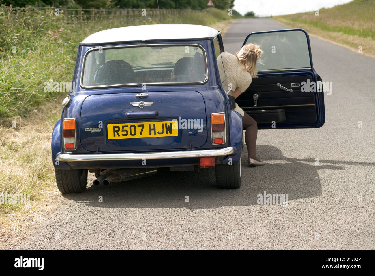 Woman mini cooper hi-res stock photography and images - Alamy