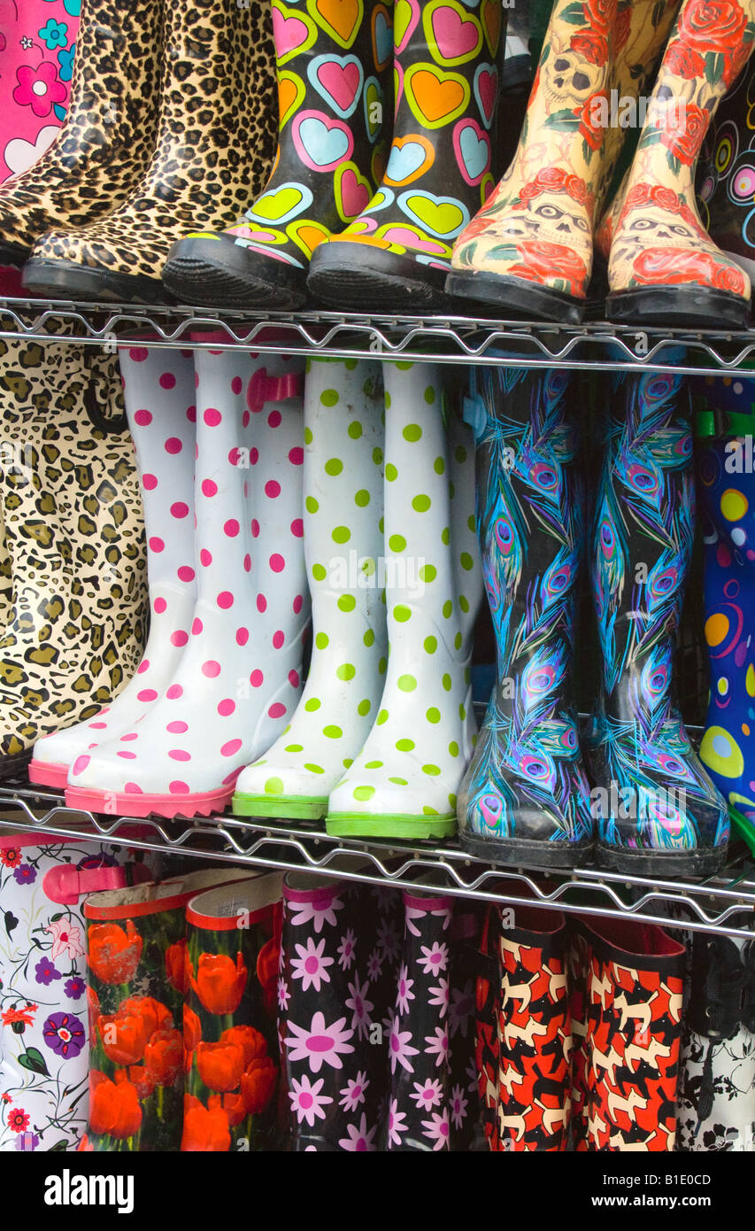 Brightly coloured boots for sale at Camden Market London Stock Photo ...