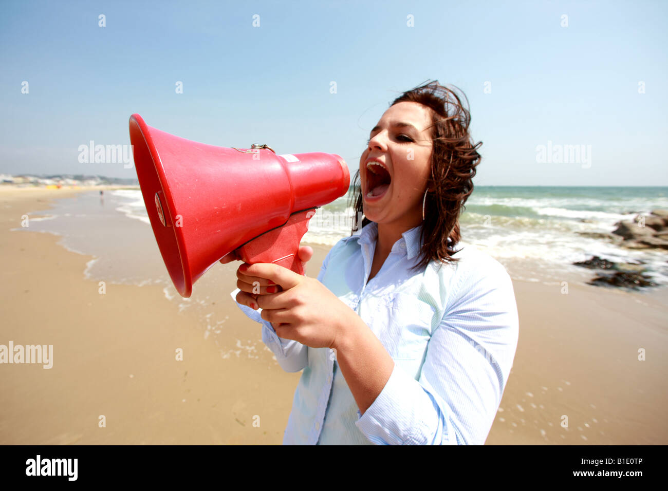 Young Woman Using Megaphone Model Released Stock Photo - Alamy
