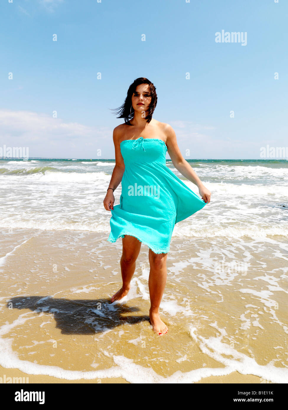 Young Woman Walking on the Beach Model Released Stock Photo - Alamy