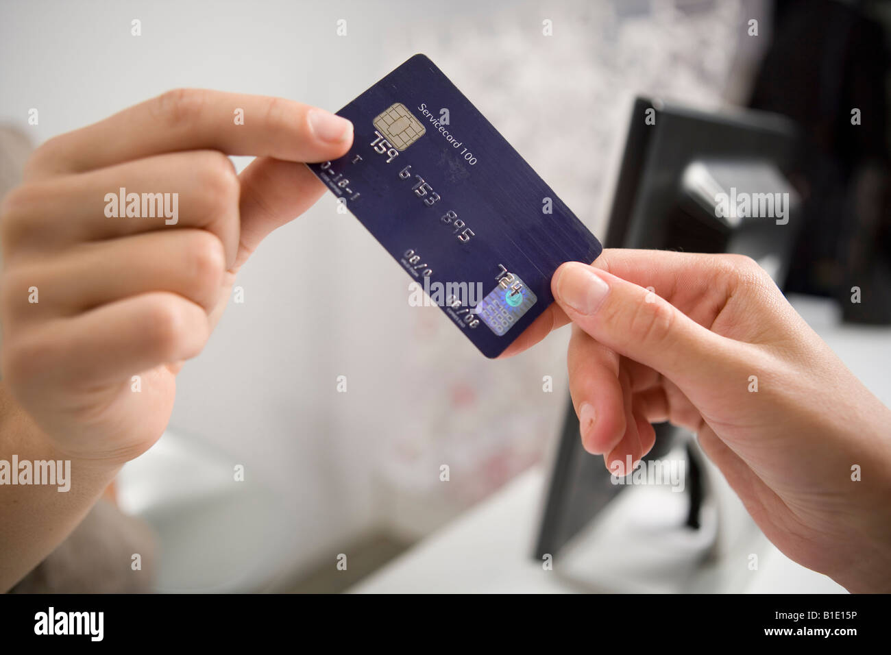 paying with credit card Stock Photo - Alamy