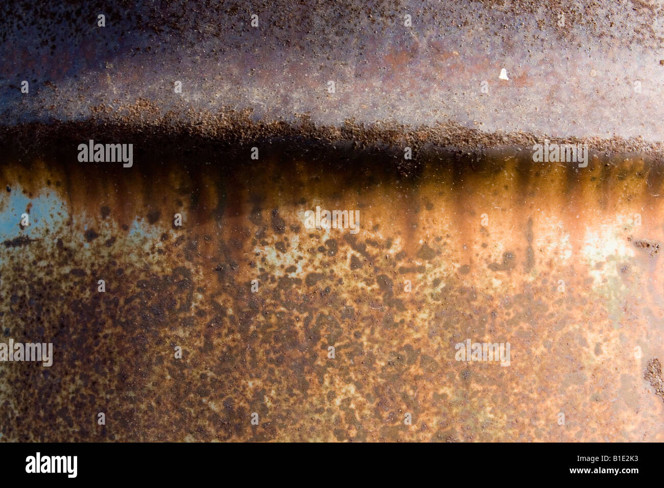 Rust on metallic background Stock Photo - Alamy