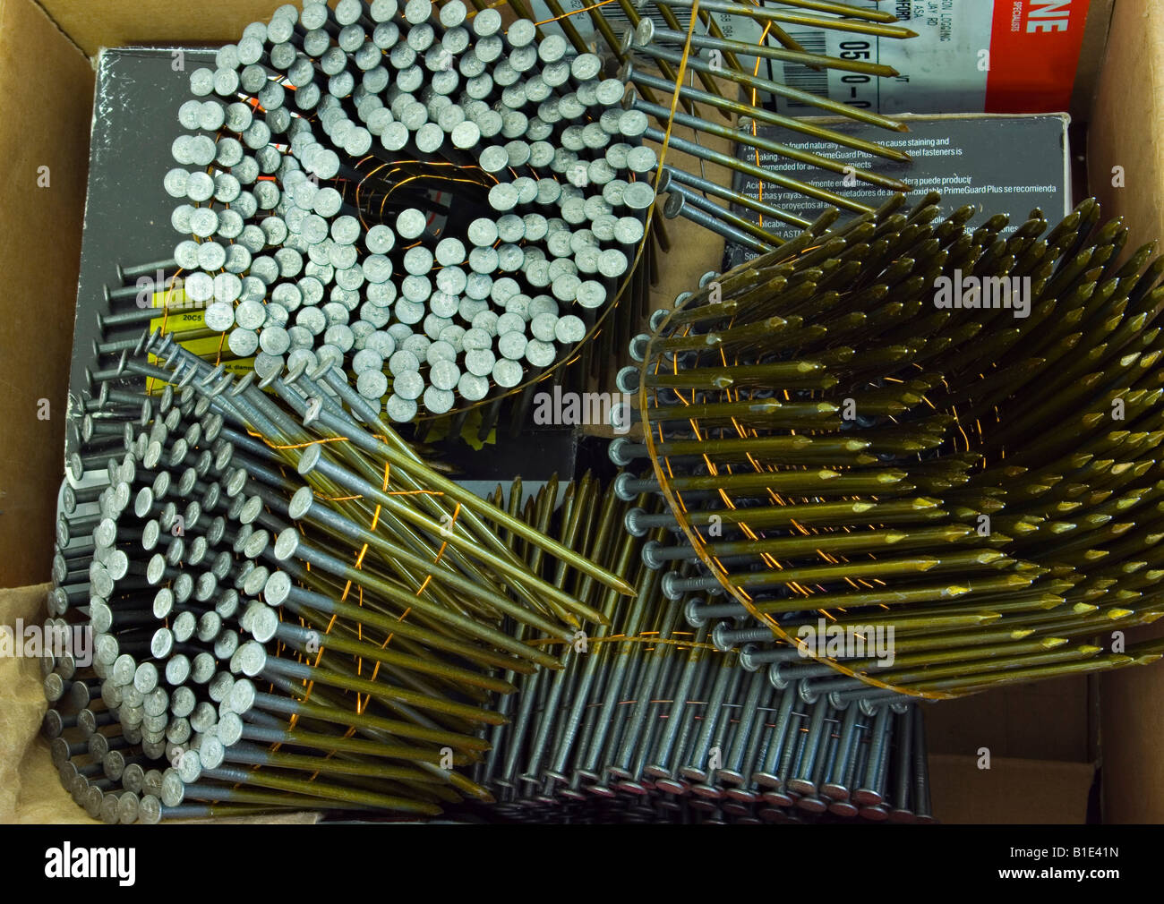 Nail rolls to be used with an air hammer Stock Photo - Alamy