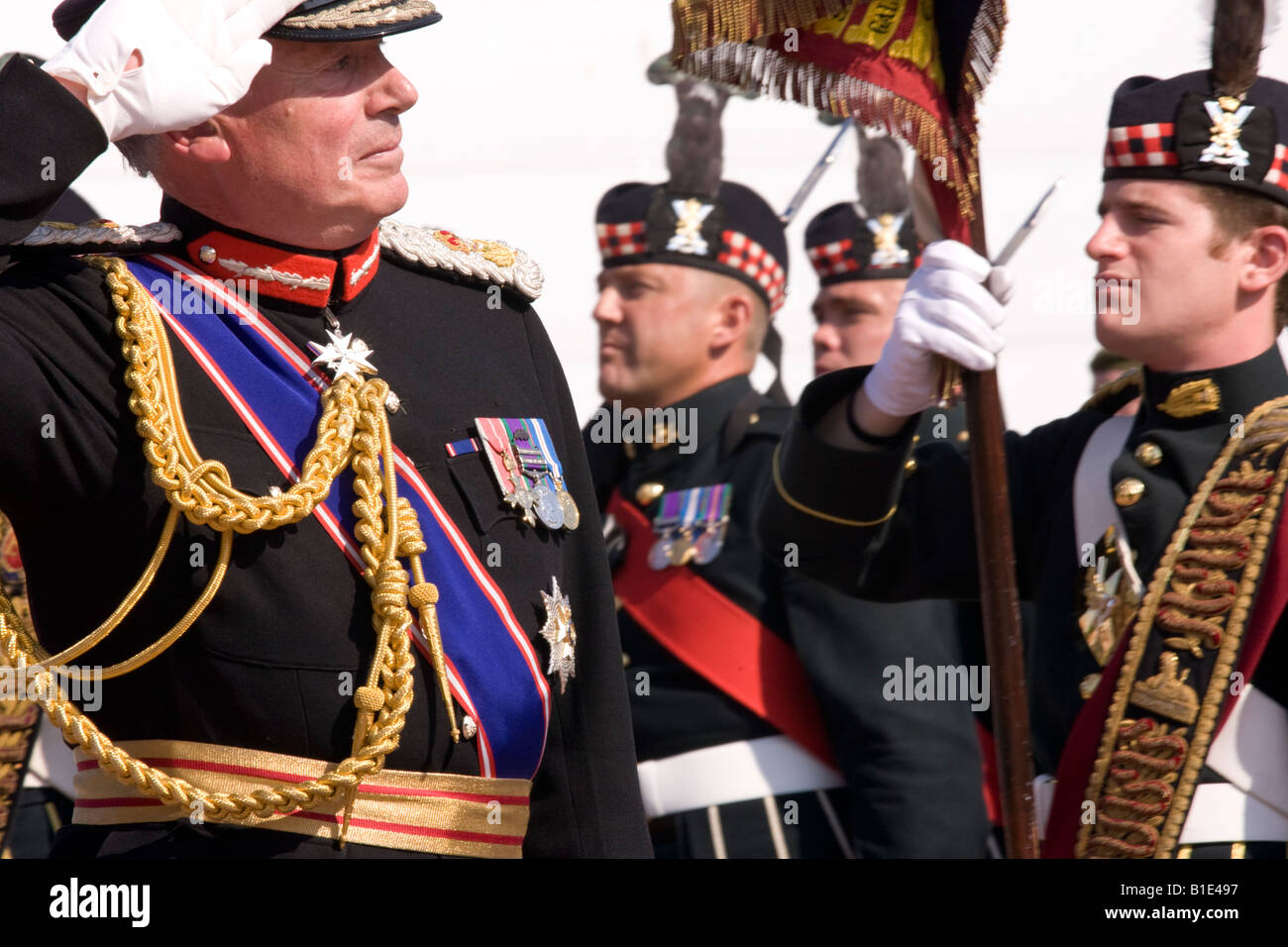 Sir Mike Jackson saluting the flag part of The Royal Regiment of ...