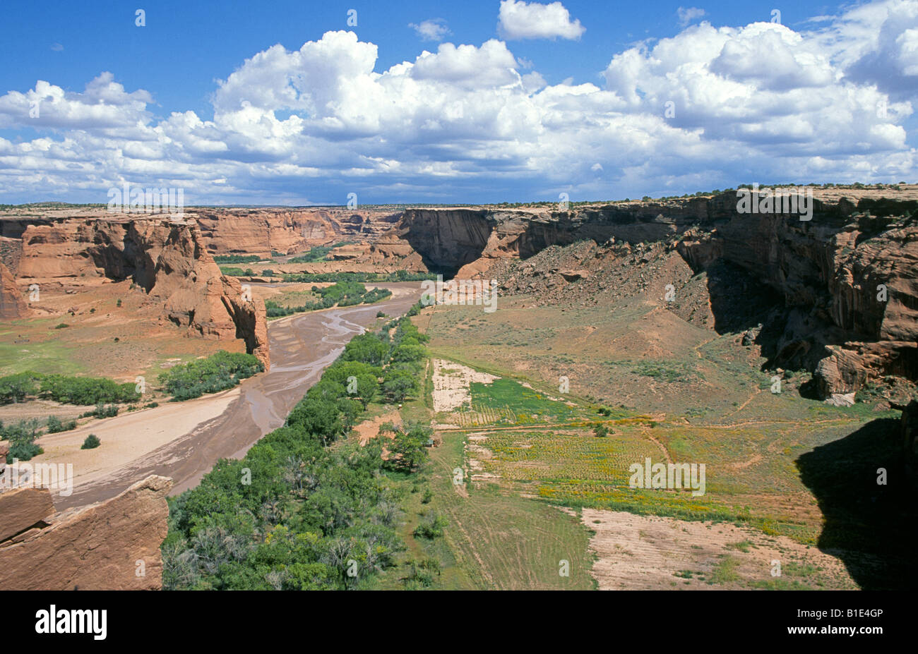 A view of the steep walls and sandy floor of Canyon de Chelly National ...