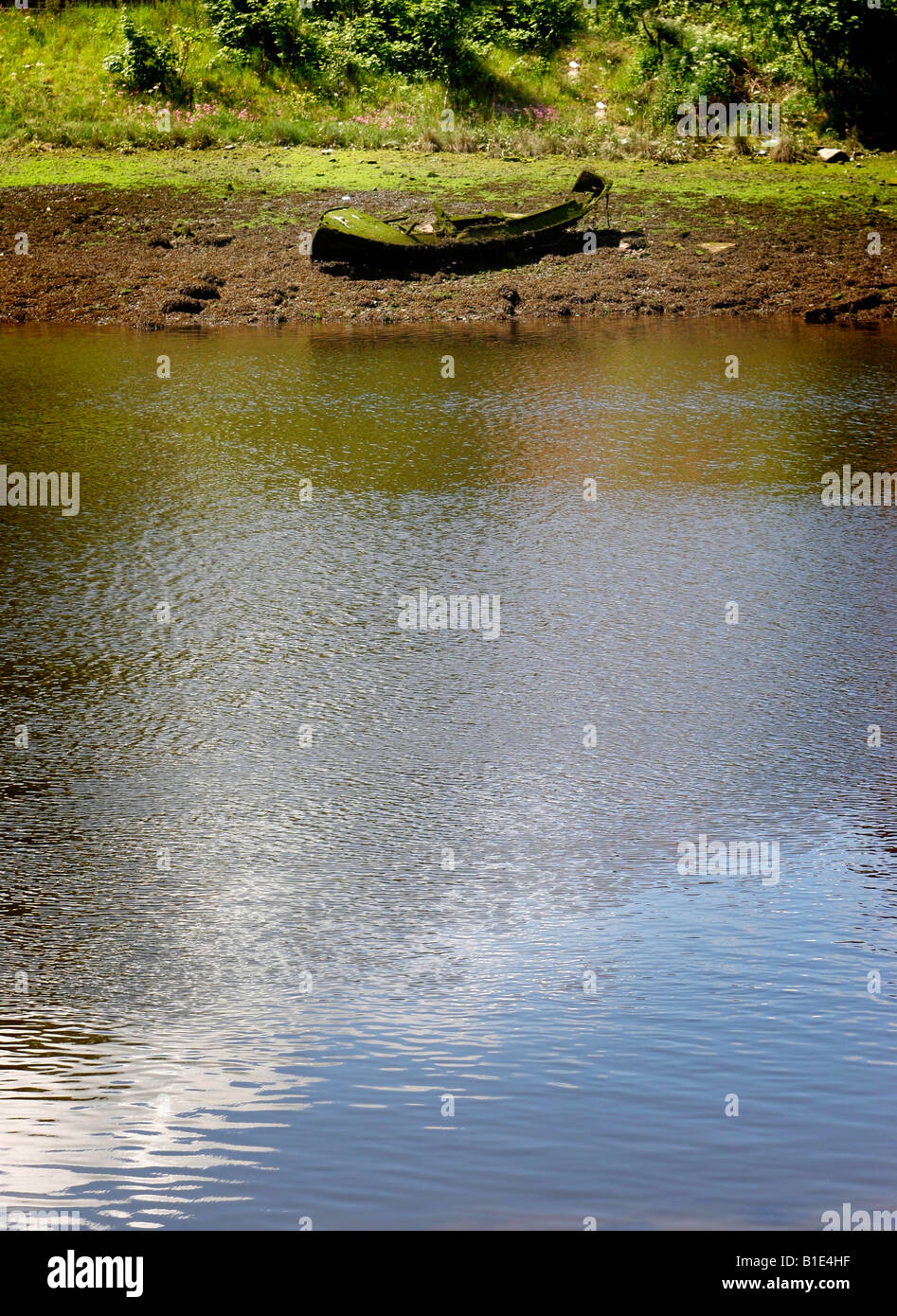 Disused wooden rowing boat hi-res stock photography and images - Alamy