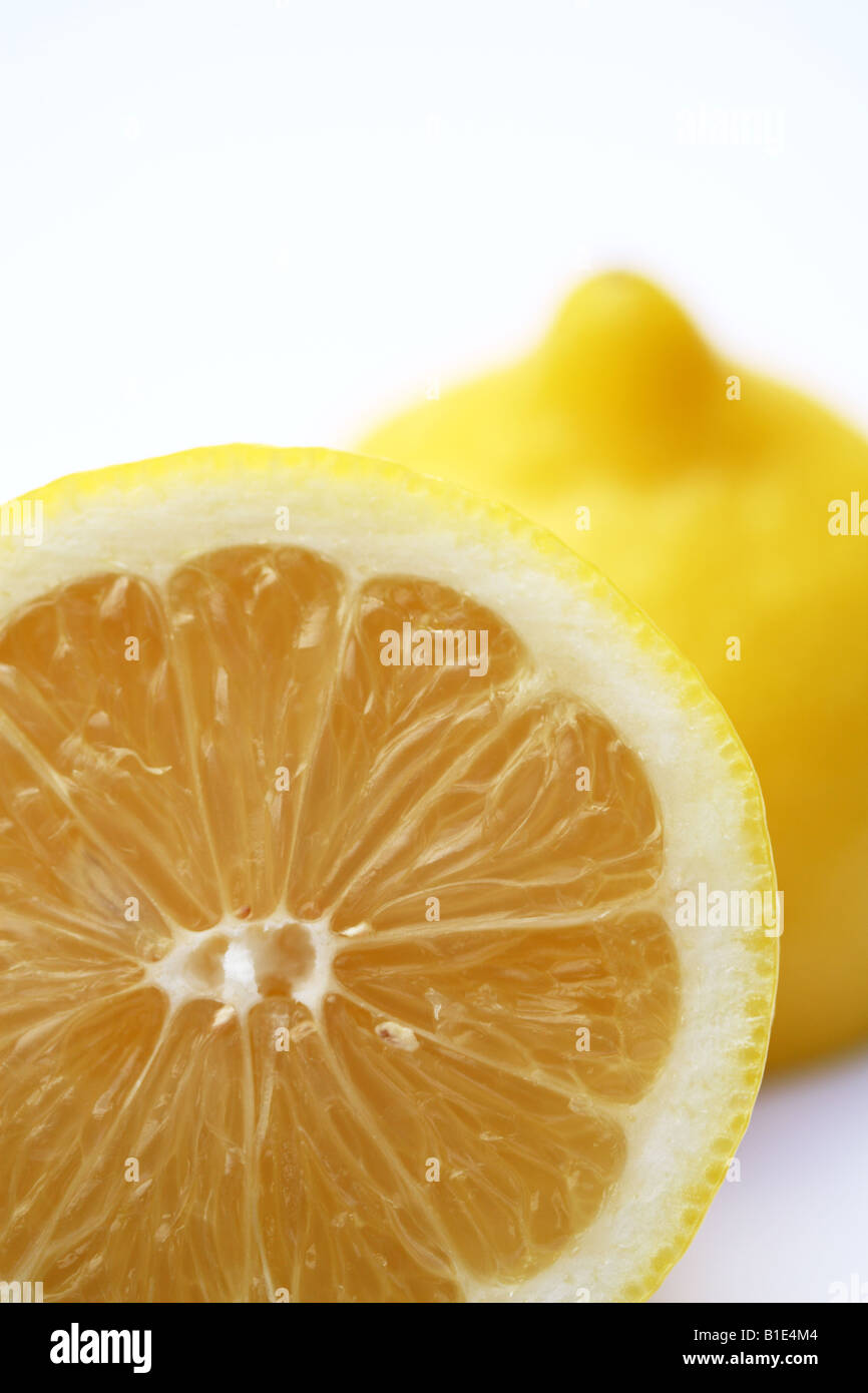 Lemon cut in half Stock Photo - Alamy