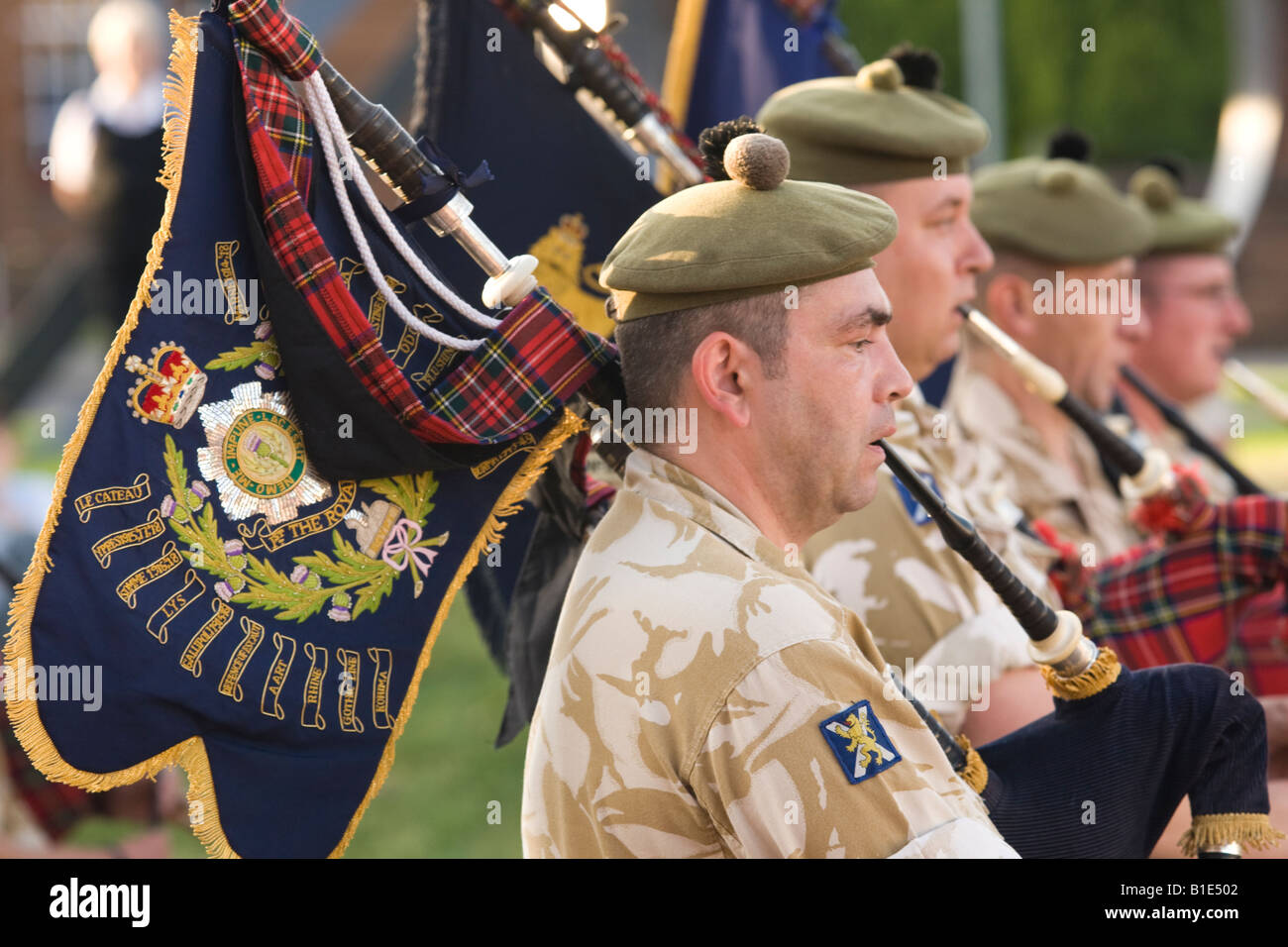 Military band of The Royal Regiment of Scotland bagpipers beating the ...