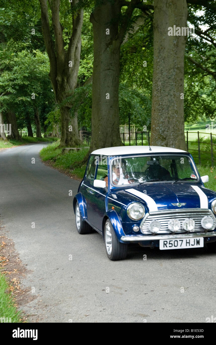 mini cooper driving on country lane Stock Photo - Alamy