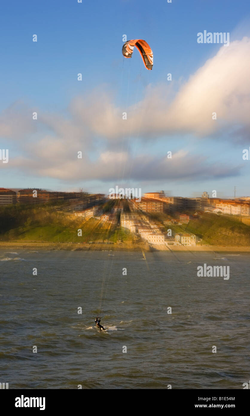 beach sport water kite surf a man practicing kite surfing in the beach ...