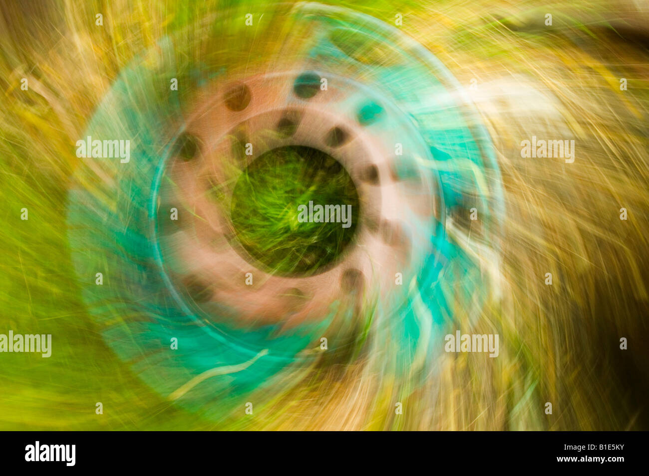 Colorful abstract tire rim and grass blurred Stock Photo - Alamy