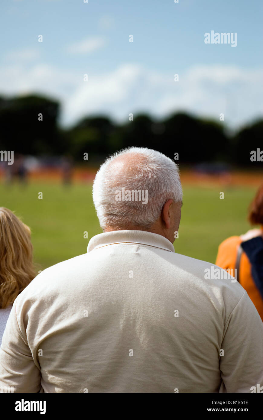 Man watching sport Stock Photo - Alamy