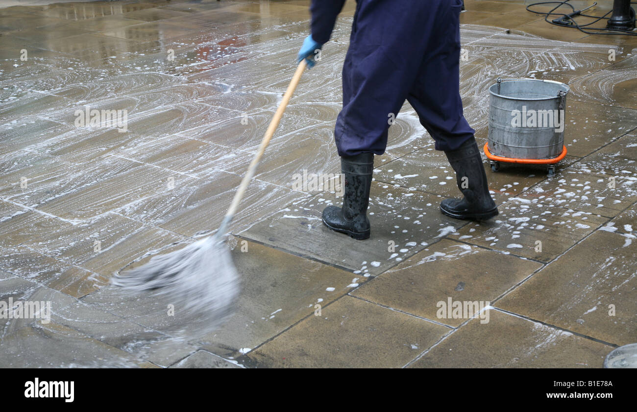Mopping pavement hi-res stock photography and images - Alamy