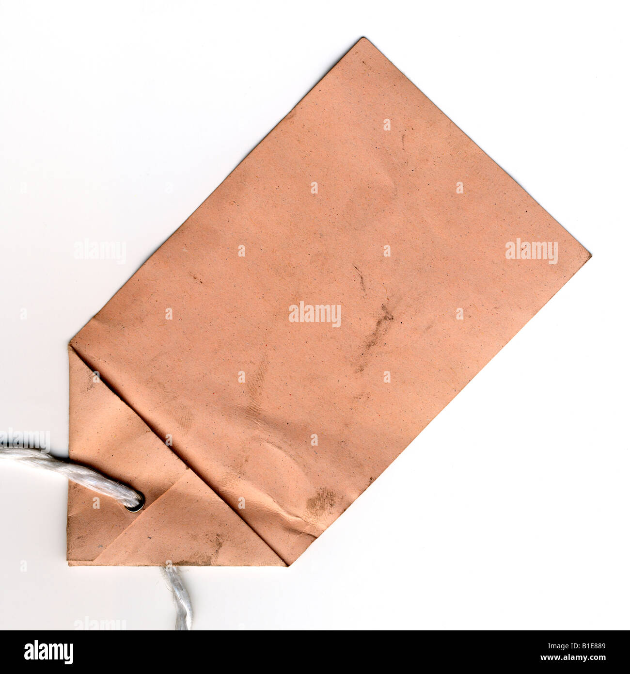 blank paper tag with string Stock Photo - Alamy