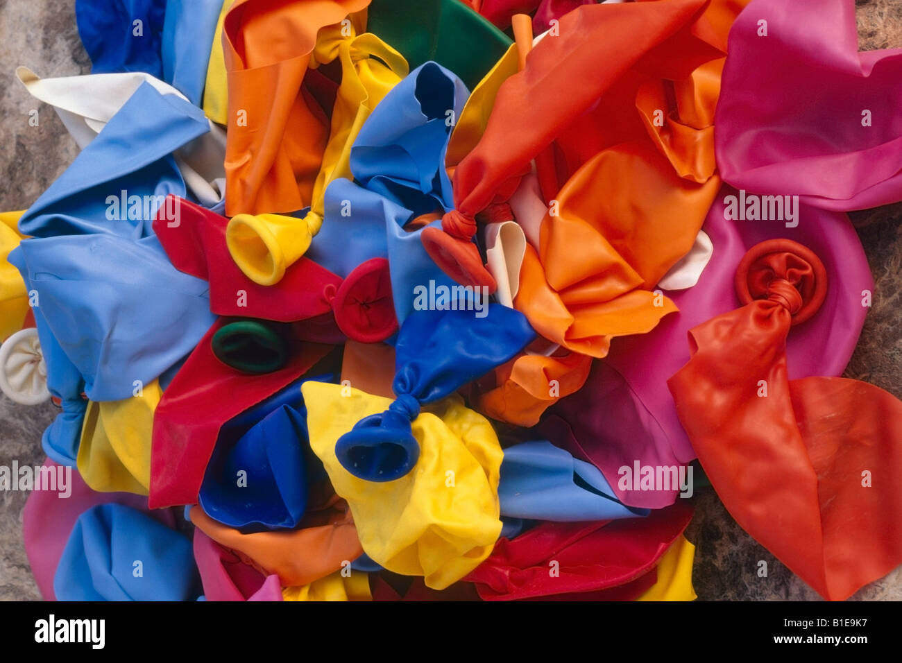 Close up of a balloon with a deflated balloon hi-res stock photography ...