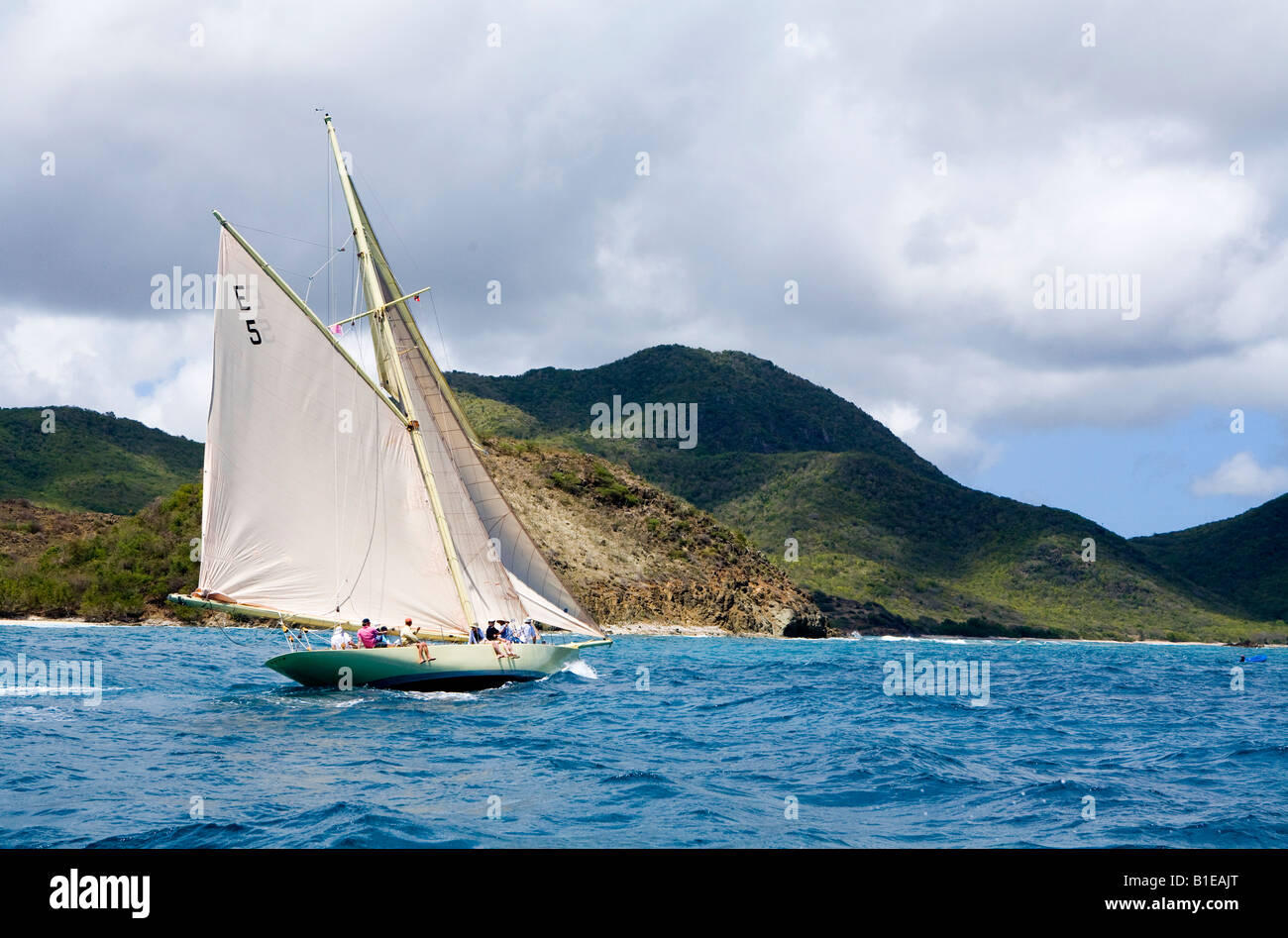 The sailing cutter SY Kate sails along the shore of Antigua during the ...