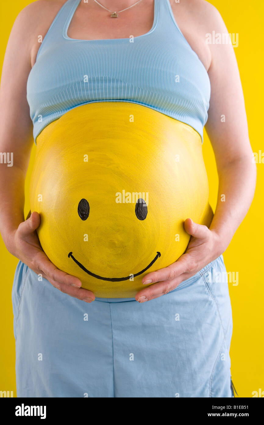 Smiley face on stomach hi-res stock photography and images - Alamy