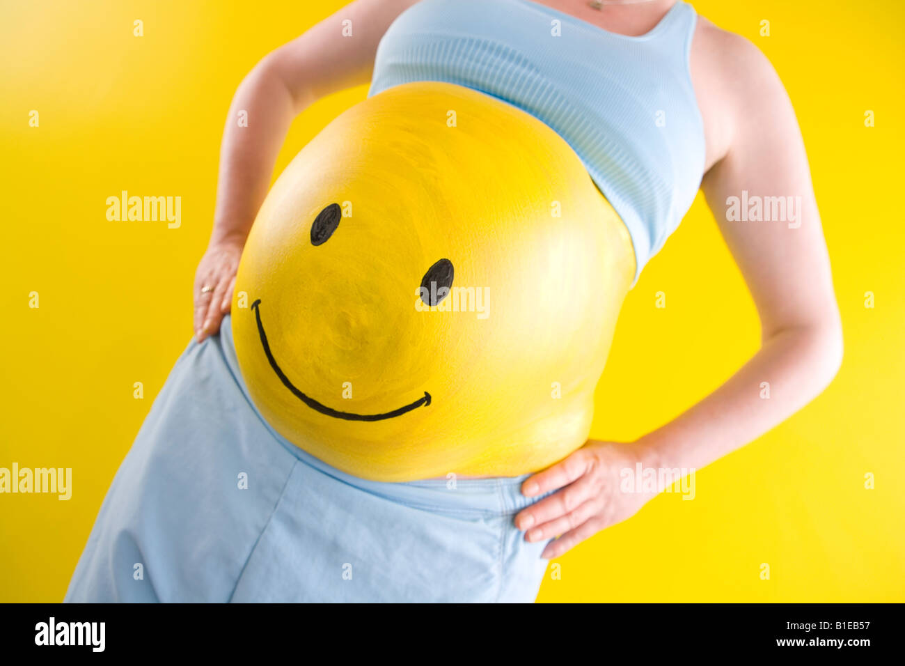 Smiley face on stomach hi-res stock photography and images - Alamy