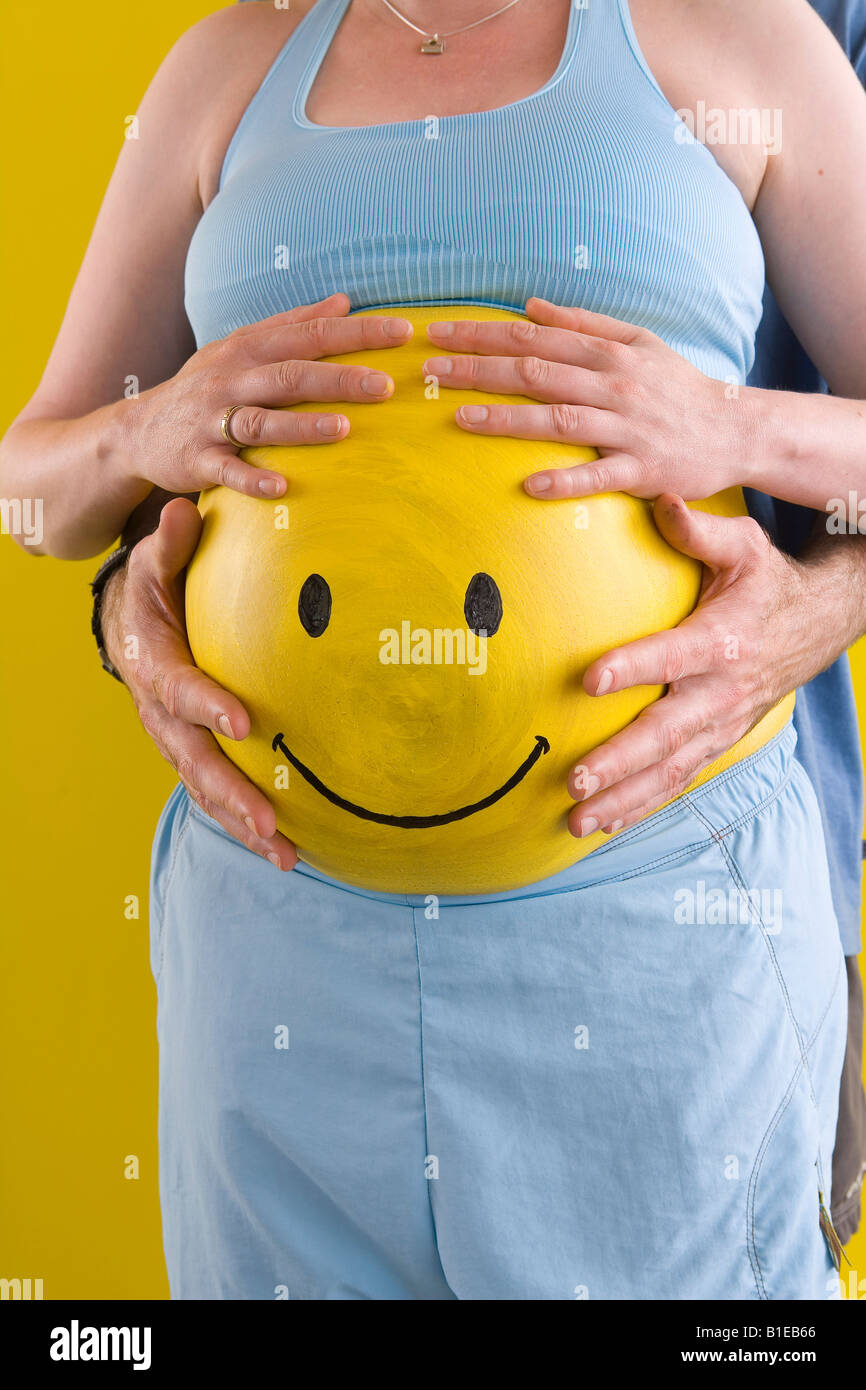 Stomach smiley face woman hi-res stock photography and images - Alamy