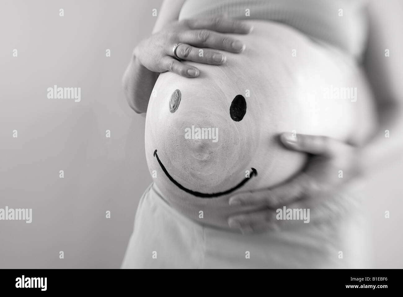 Smiley face on stomach hi-res stock photography and images - Alamy