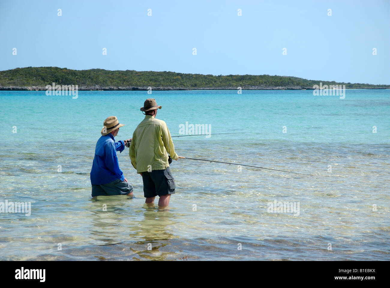 Two fly fisherman fishing for bonefish in the salt water flats of the ...