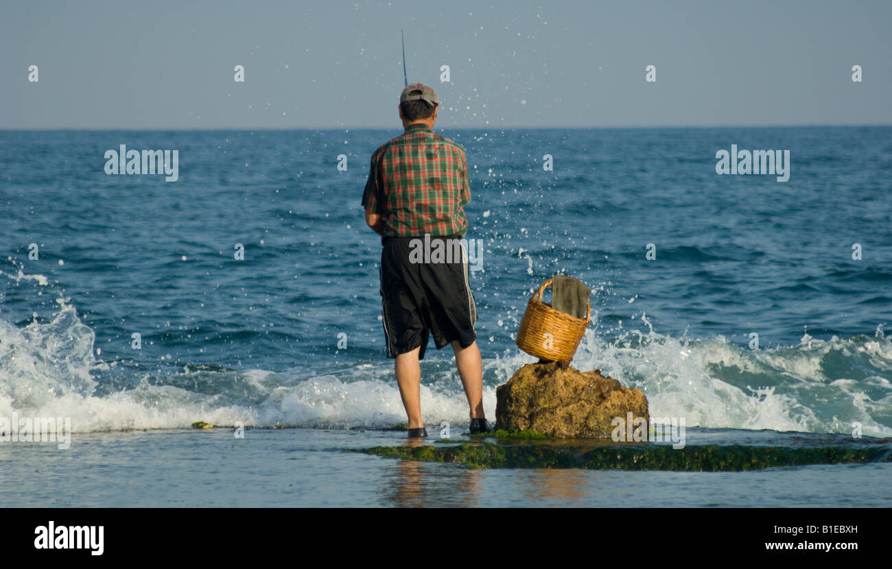 Fishing on the Beirut coastline Stock Photo - Alamy