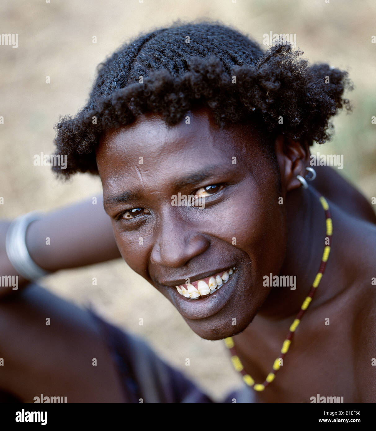 An unusual braided hairstyle of a Dassanech young man of the Omo River ...