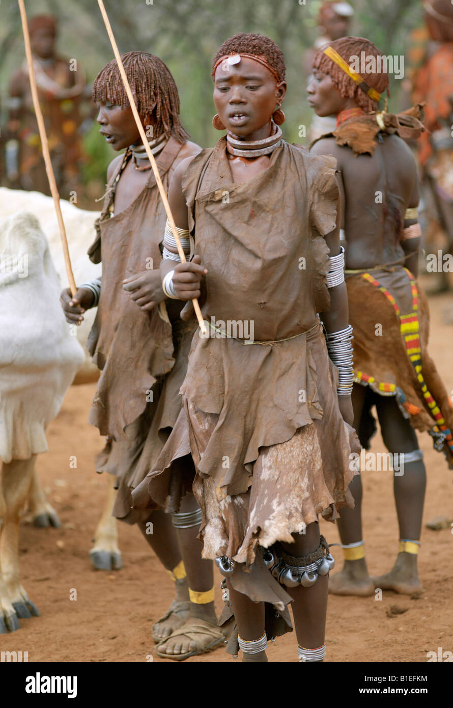 Hamar women dance at a 'Jumping of the Bull' ceremony. The Hamar are ...