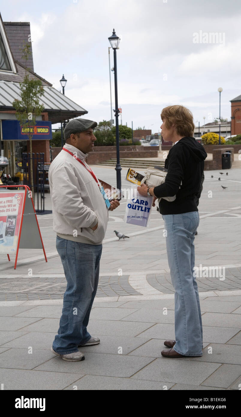 Woman selling the big issue hi-res stock photography and images - Alamy